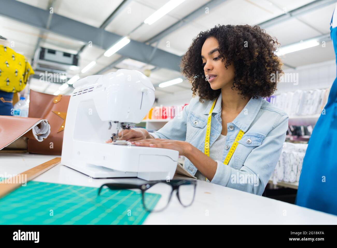 female industrial tailor at work Stock Photo - Alamy