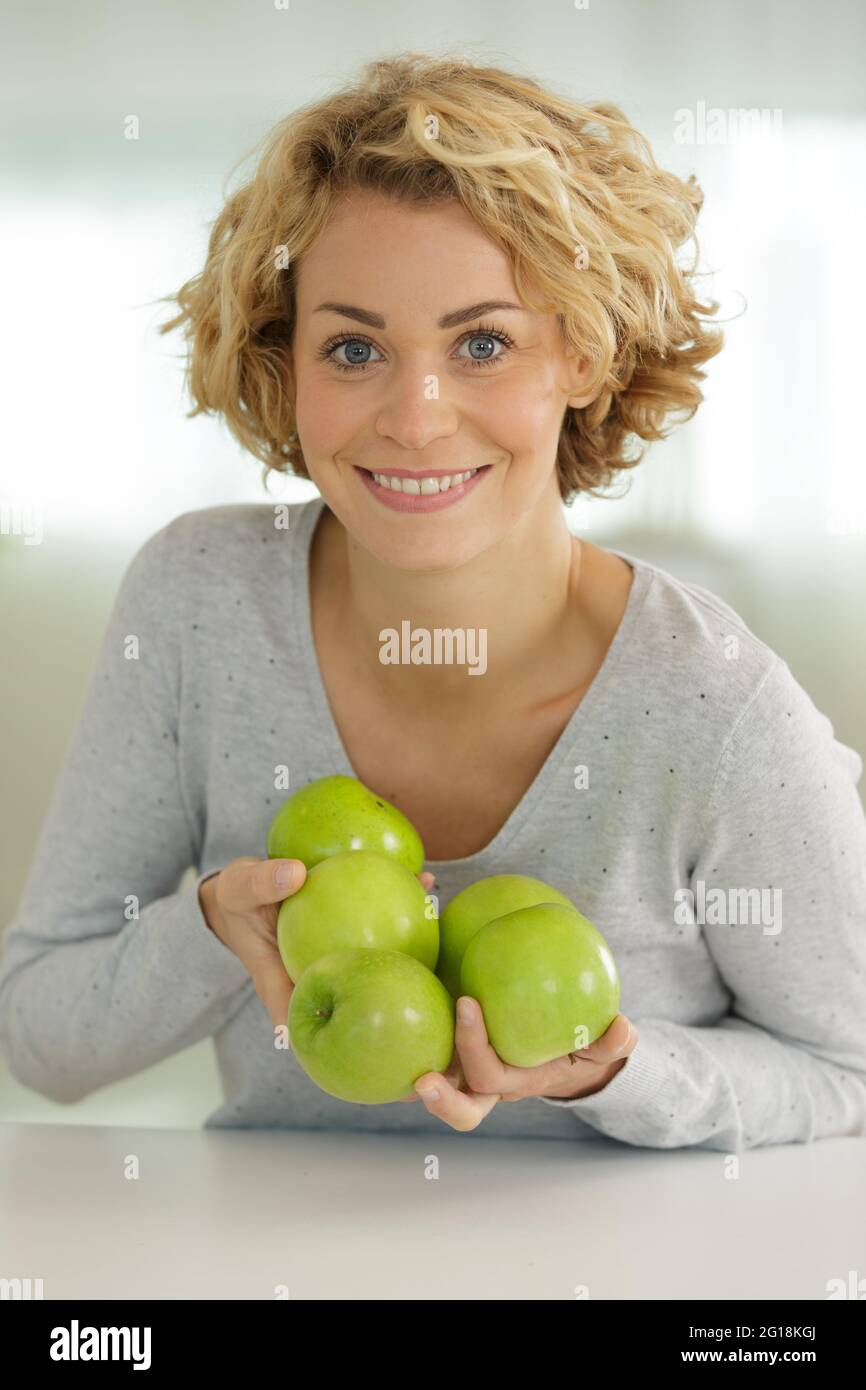 concept of woman with apple Stock Photo - Alamy