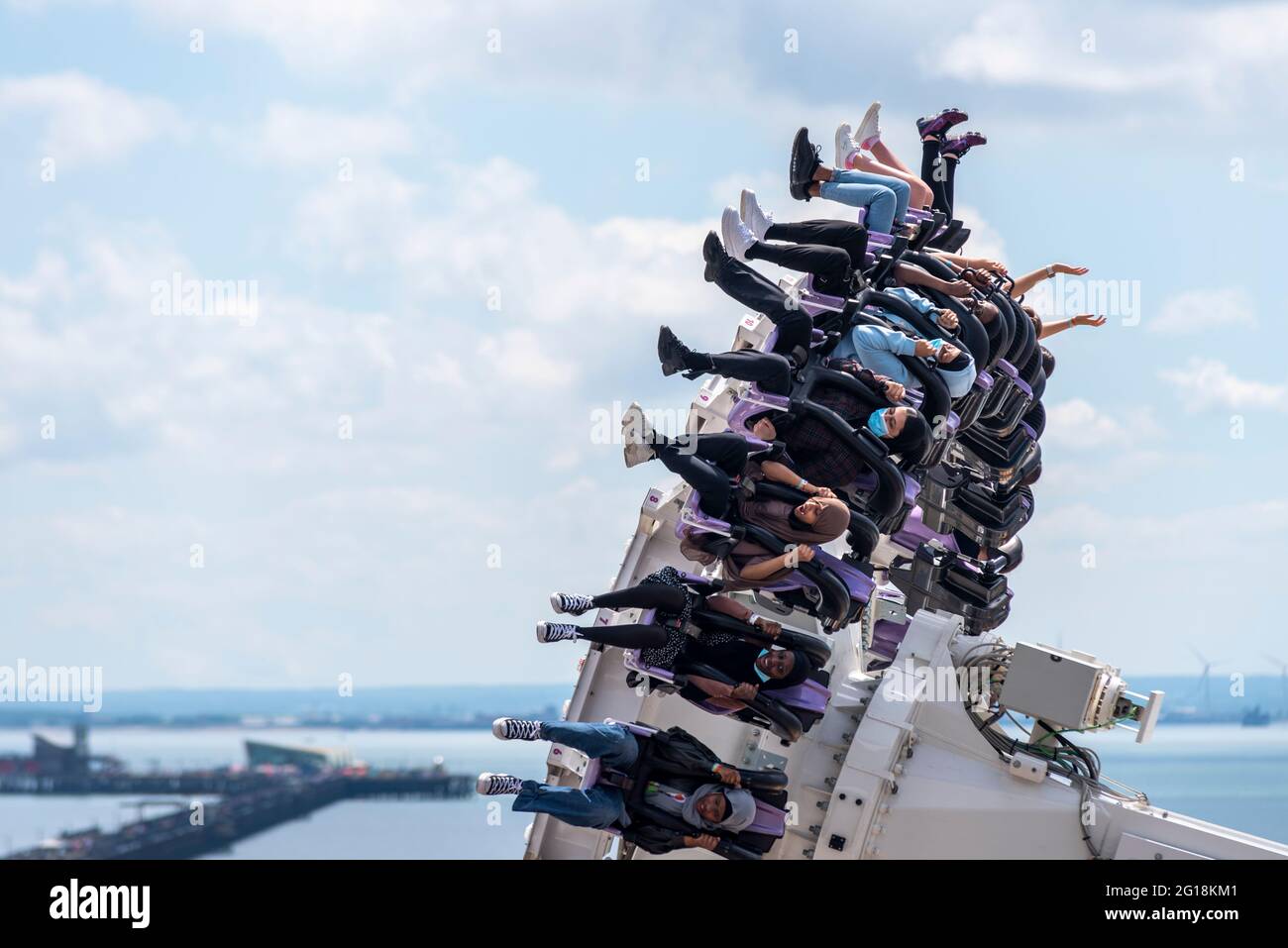 Ethnic thrill riders on the Axis thrill ride of Adventure Island ...