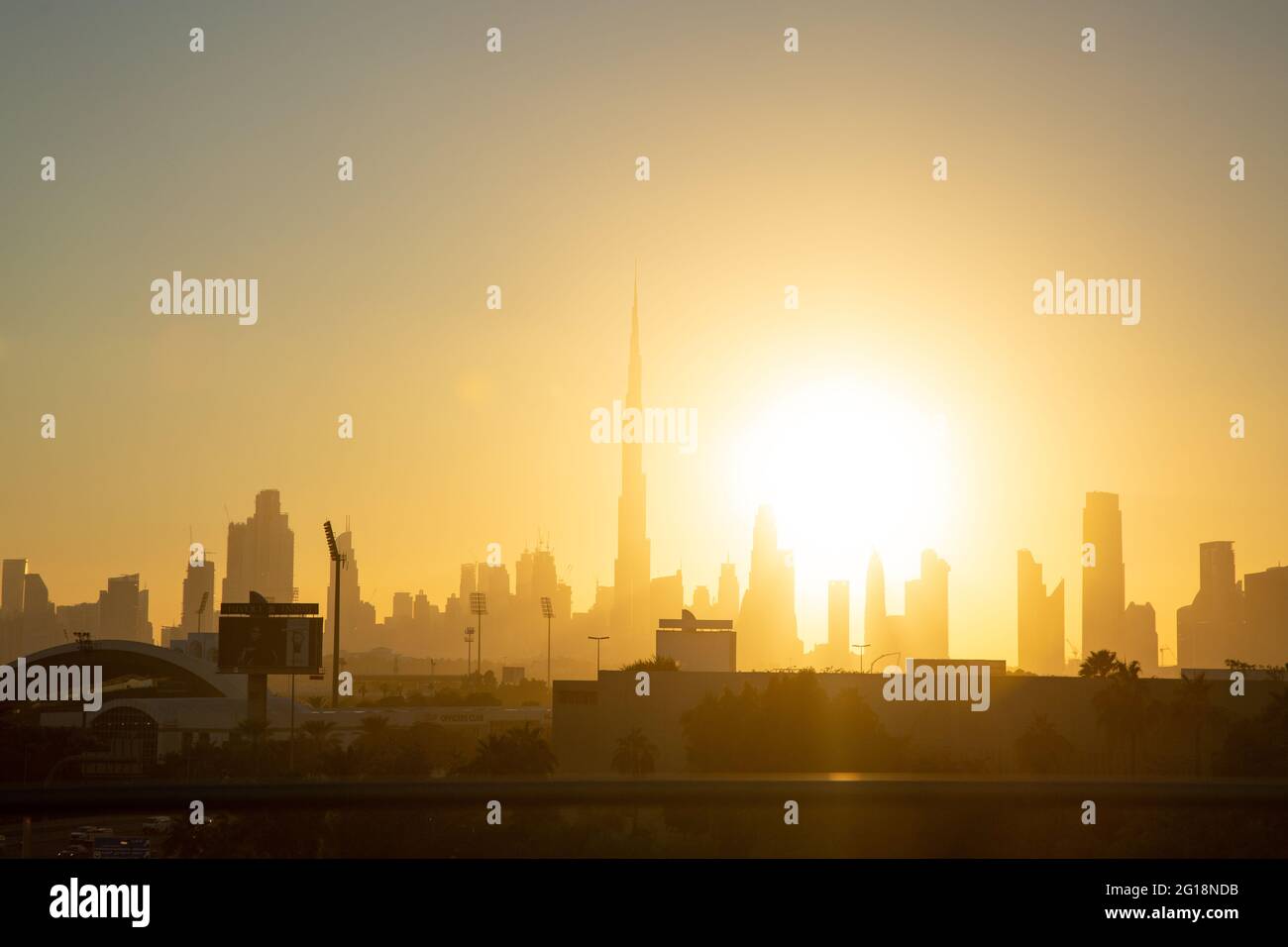 Sunset cityscape skyscrapers in dubai hi-res stock photography and ...