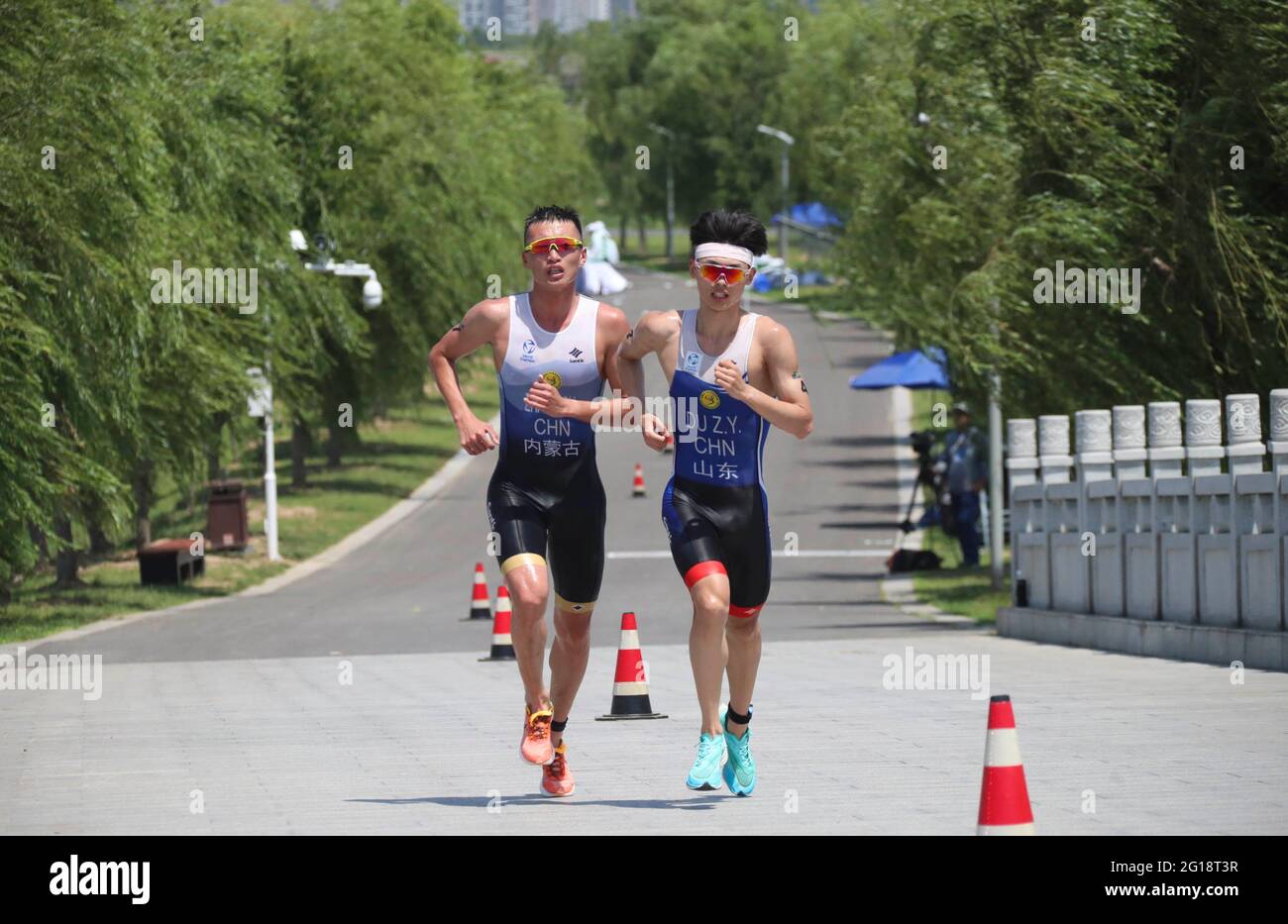 HUAI'AN, CHINA - JUNE 5, 2021 - Participants take part in an Ironman ...