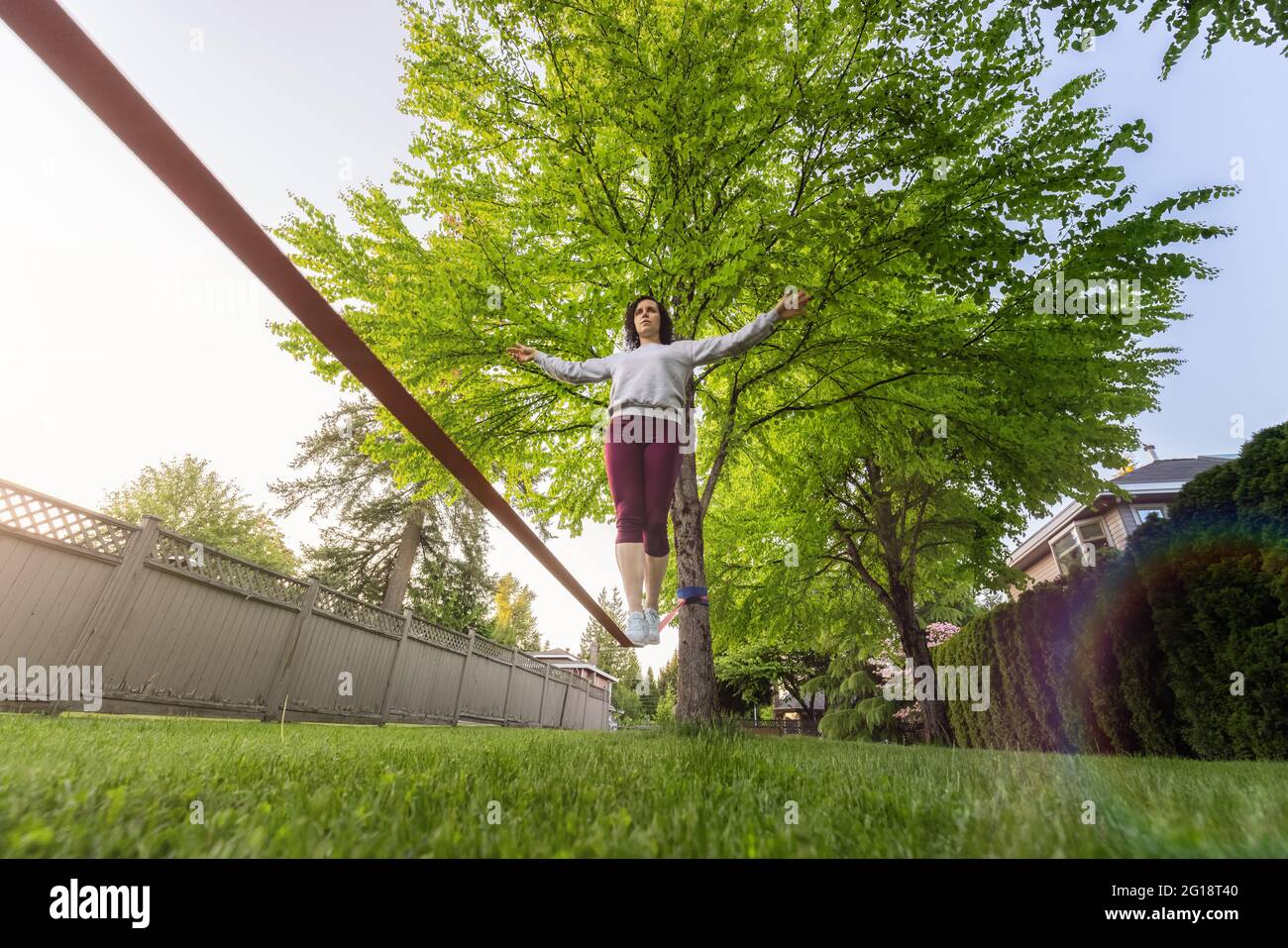 Slack line and female hi-res stock photography and images - Alamy