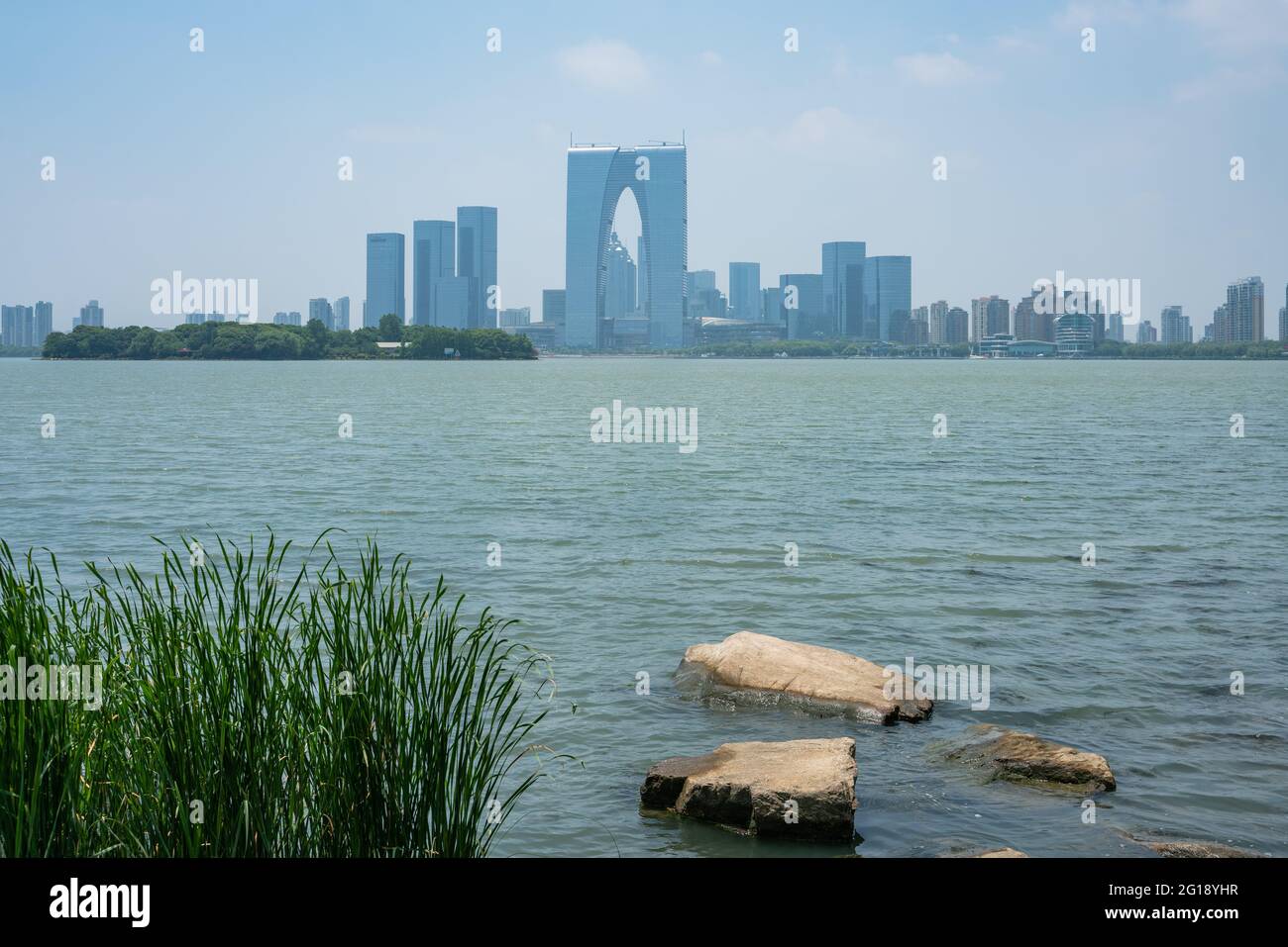The skyline of Suzhou along the Jinji Lake, on a sunny day Stock Photo ...