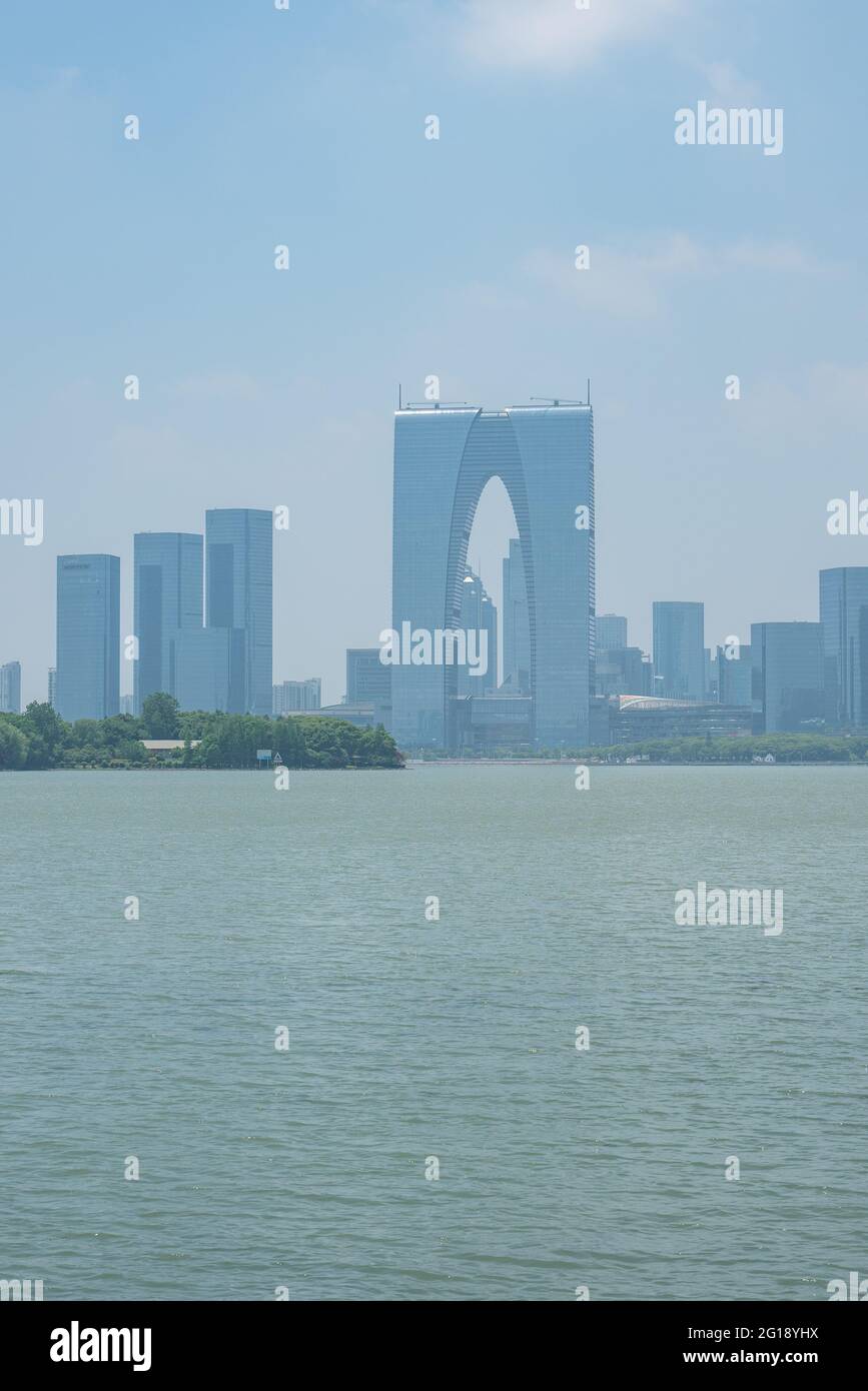The skyline of Suzhou along the Jinji Lake, on a sunny day Stock Photo ...