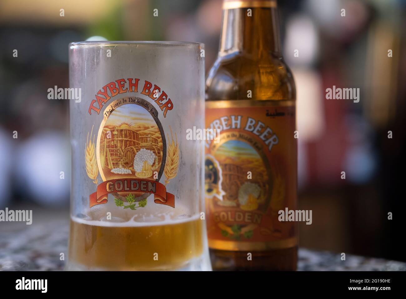 A glass with the local Palestinian Taybeh beer Stock Photo - Alamy