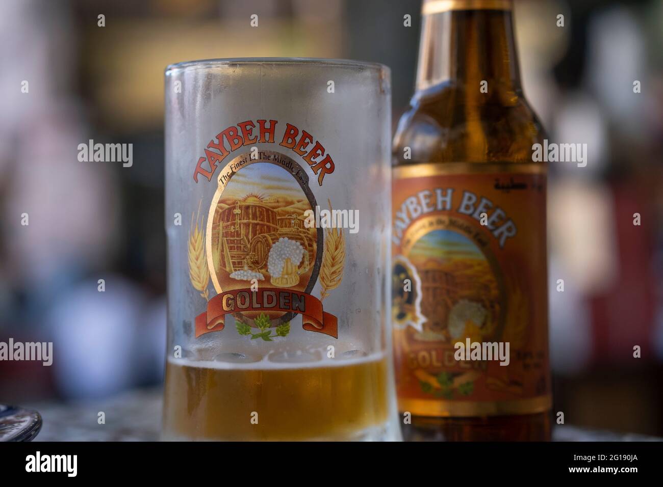 A glass with the local Palestinian Taybeh beer Stock Photo - Alamy