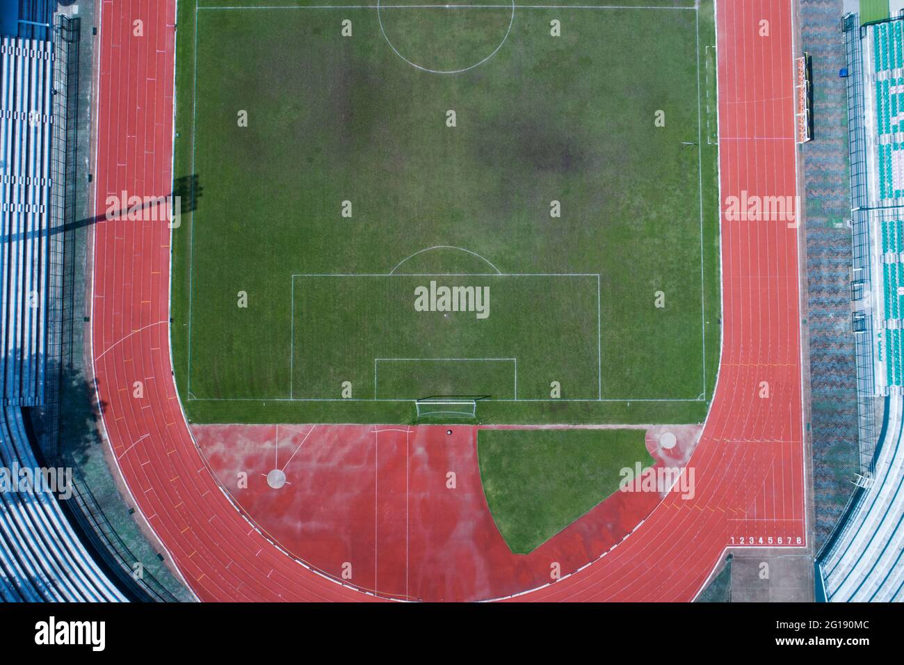 Aerial view of empty green football field with running track Empty ...