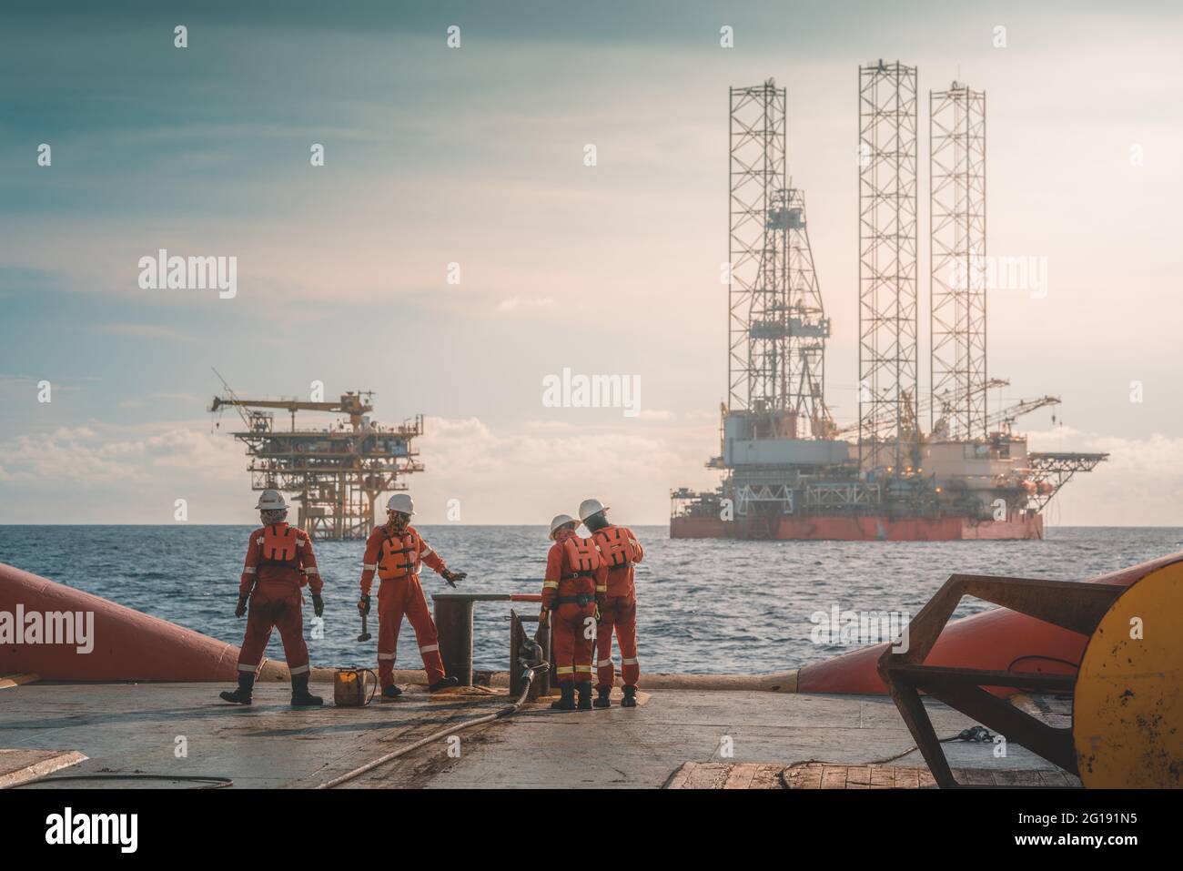 Offshore worker involvement in anchor handling operation Stock Photo ...