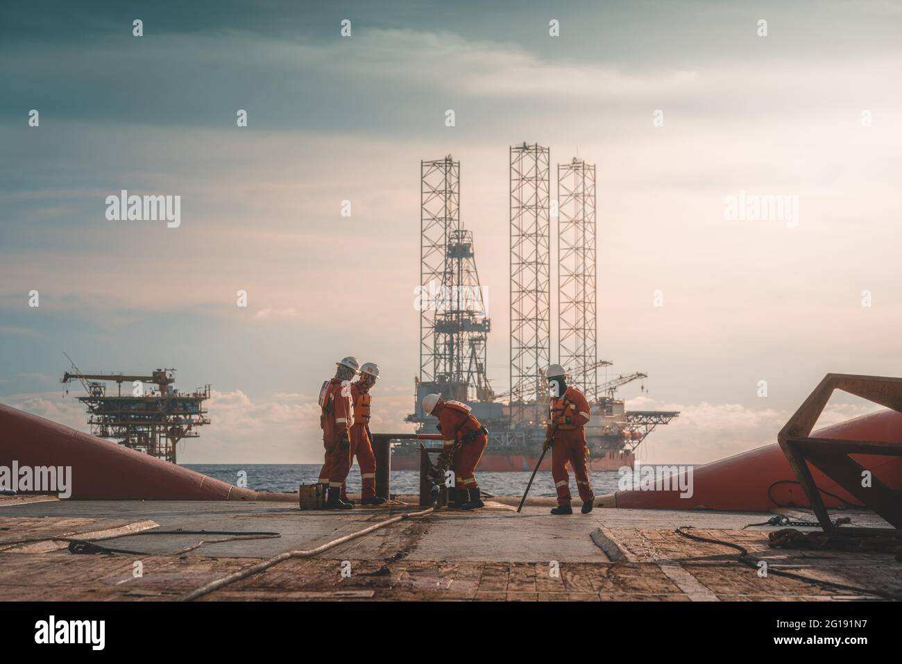 Offshore worker involvement in anchor handling operation Stock Photo ...