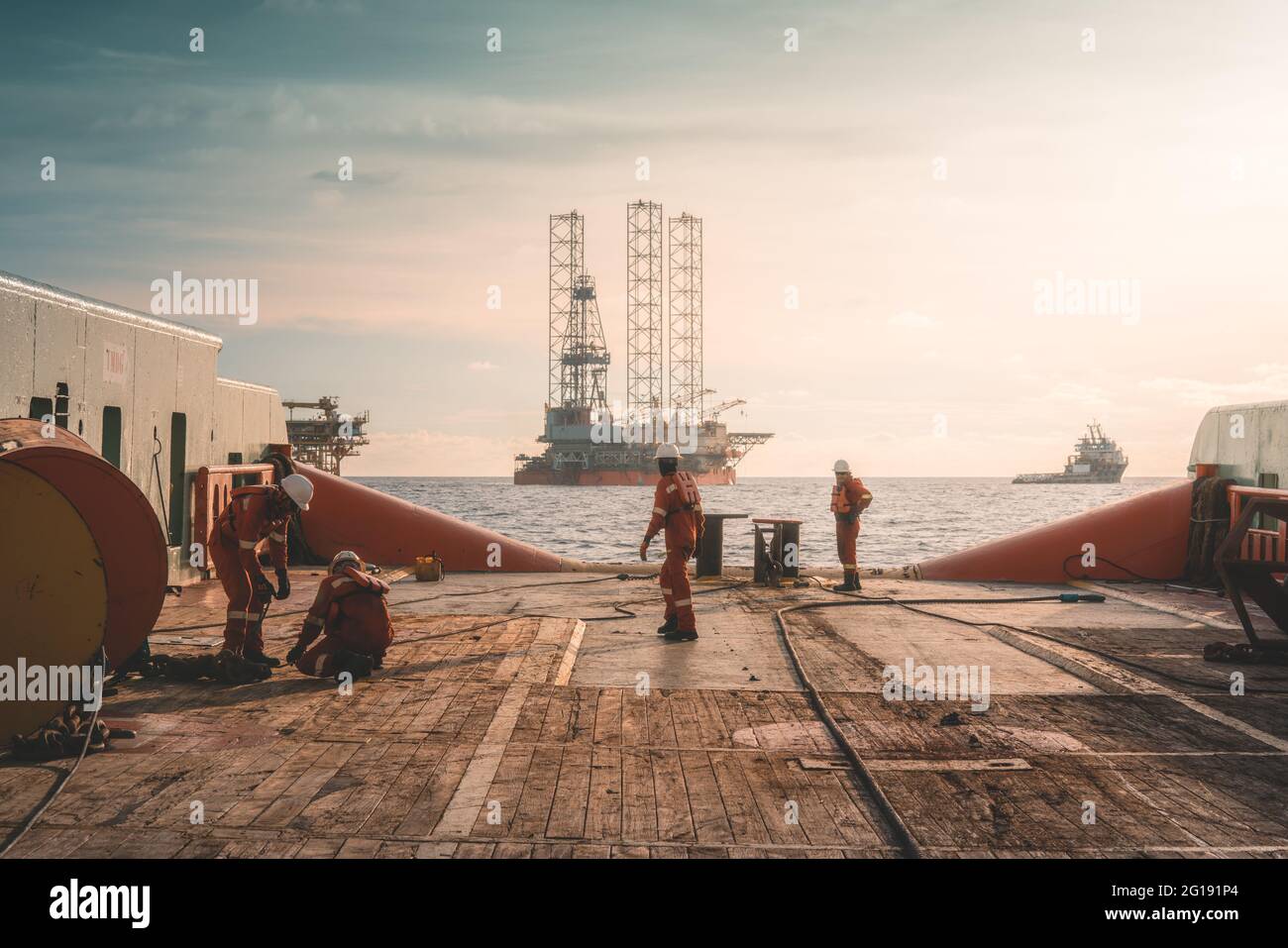 Offshore worker involvement in anchor handling operation Stock Photo ...