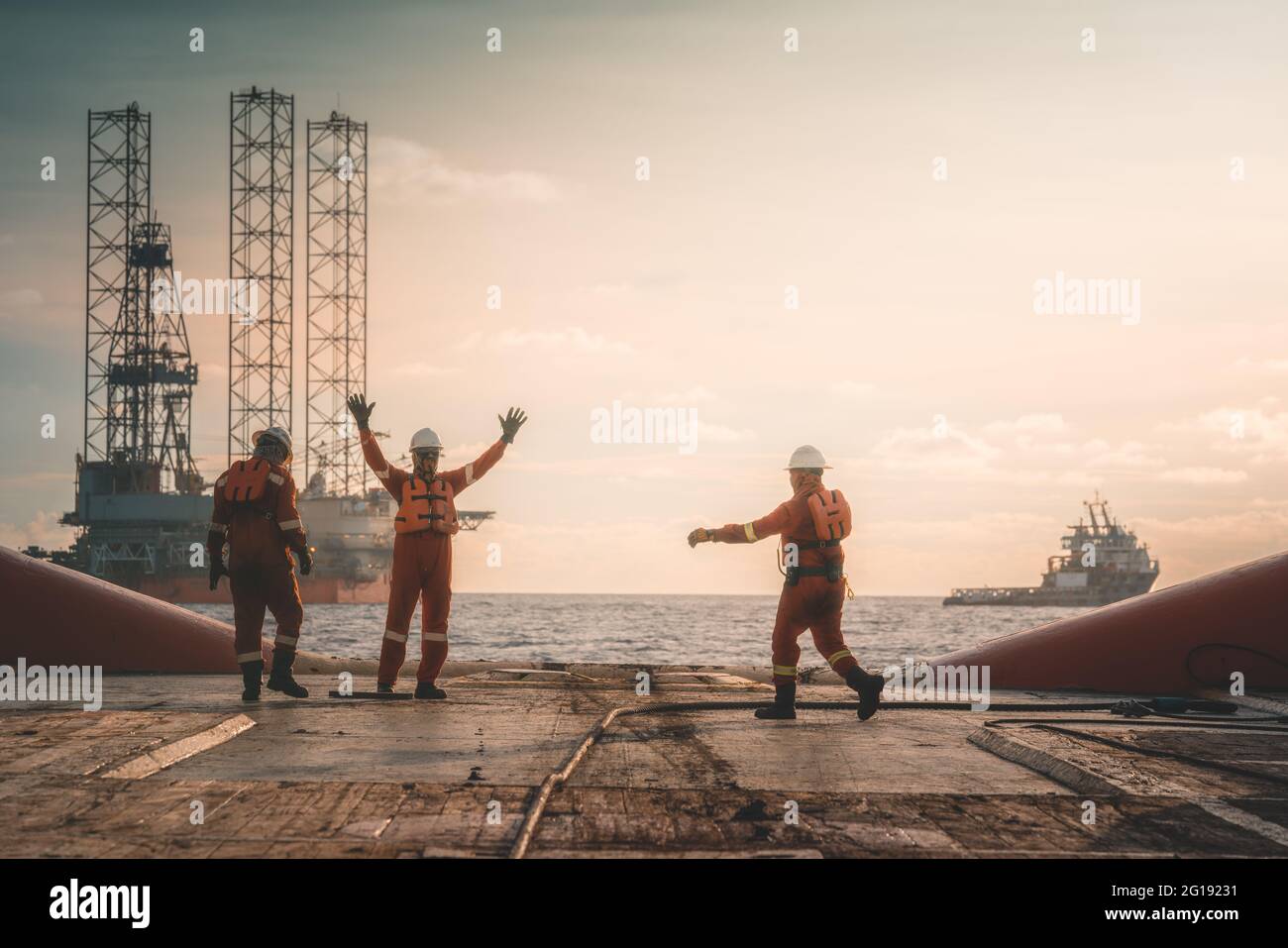 Offshore worker involvement in anchor handling operation Stock Photo ...