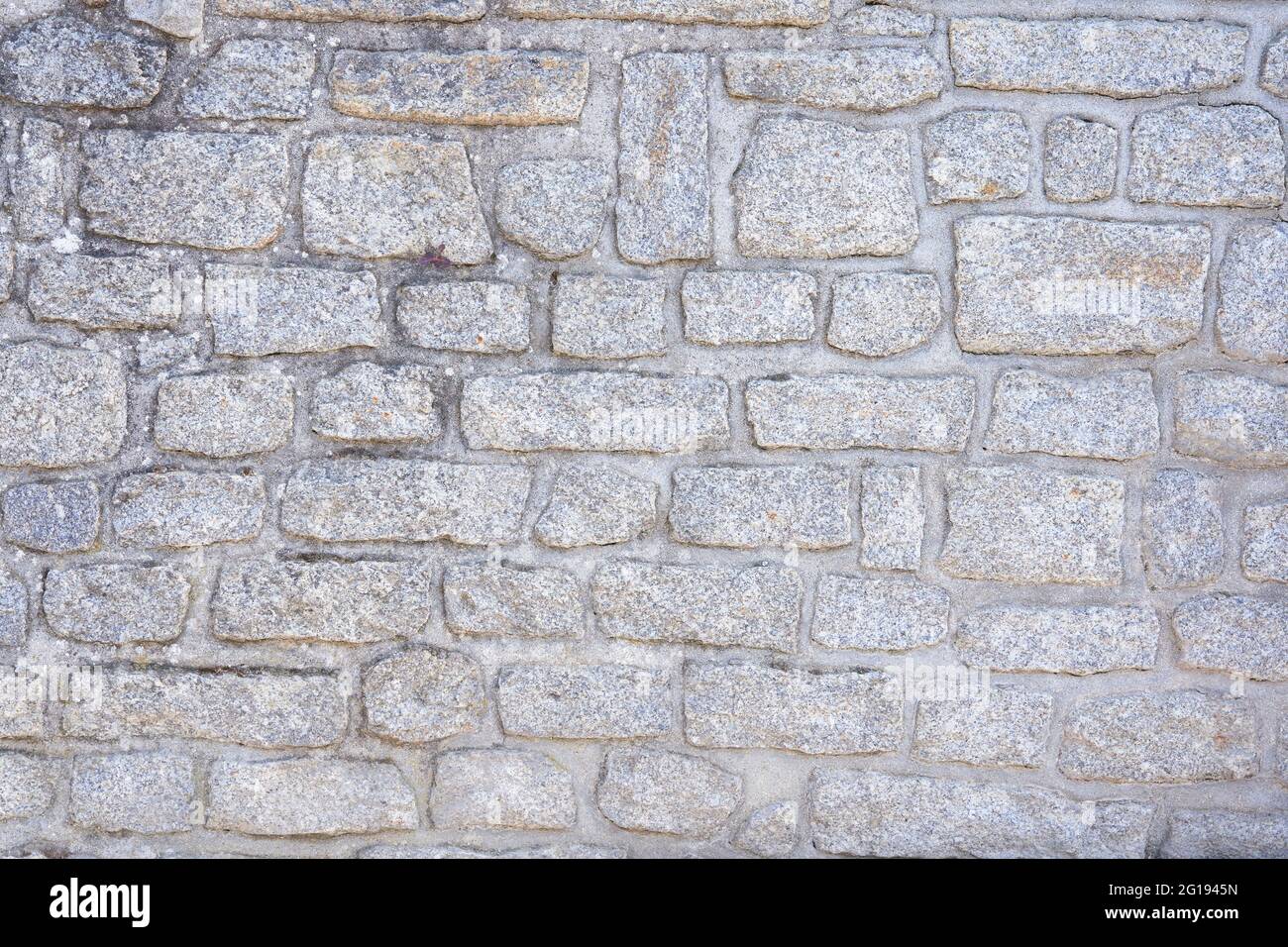 Grey stone wall texture background Stock Photo - Alamy