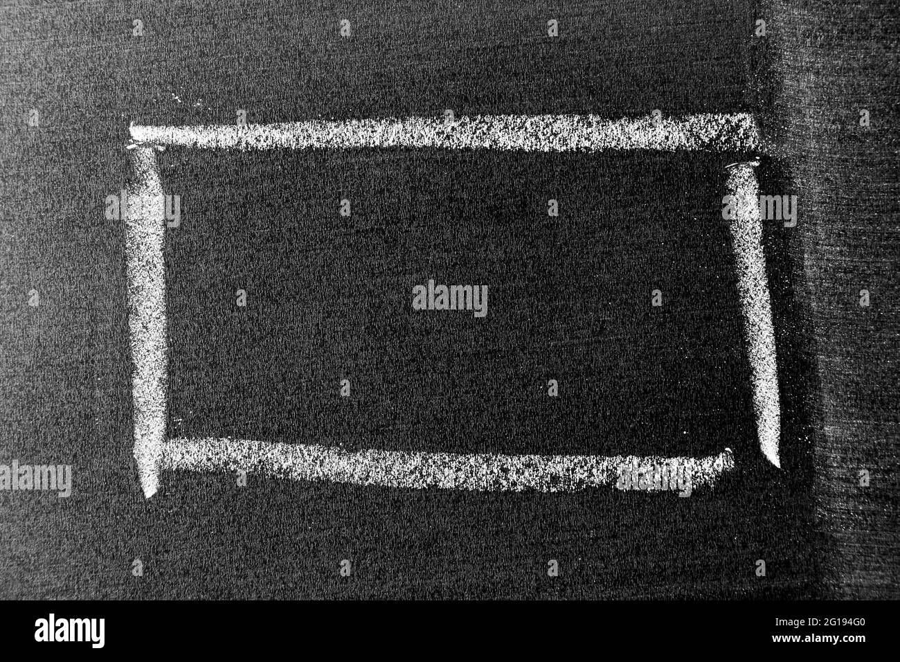 White color chalk hand drawing as square or rectangle shape on ...