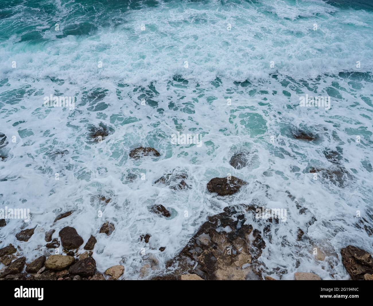 Beautiful view of ocean waves and a fantastic rocky shore, Sea patterns ...