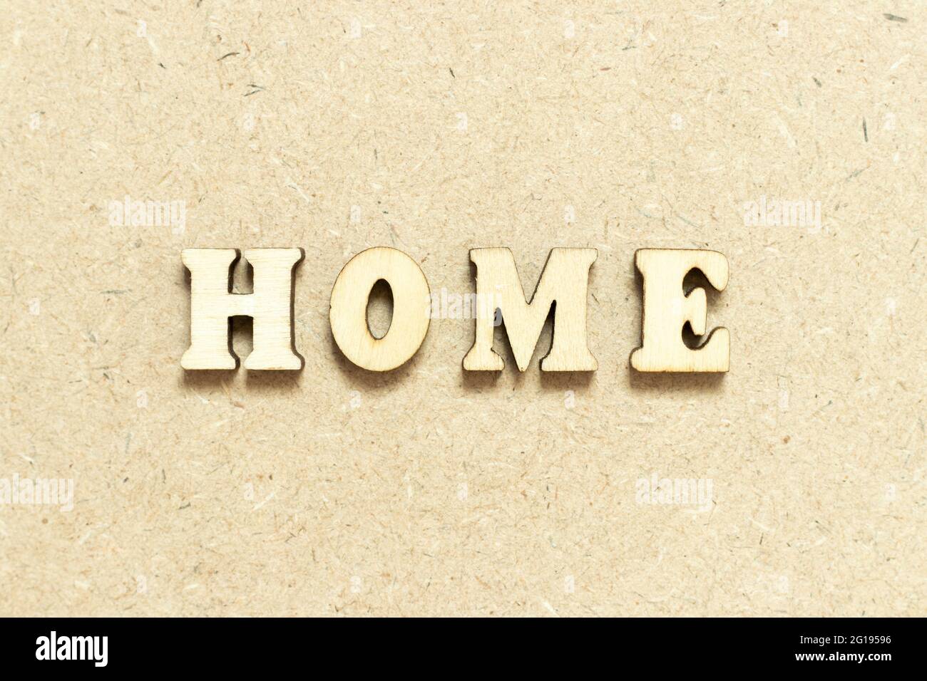 Alphabet letter in word home on wood background Stock Photo - Alamy