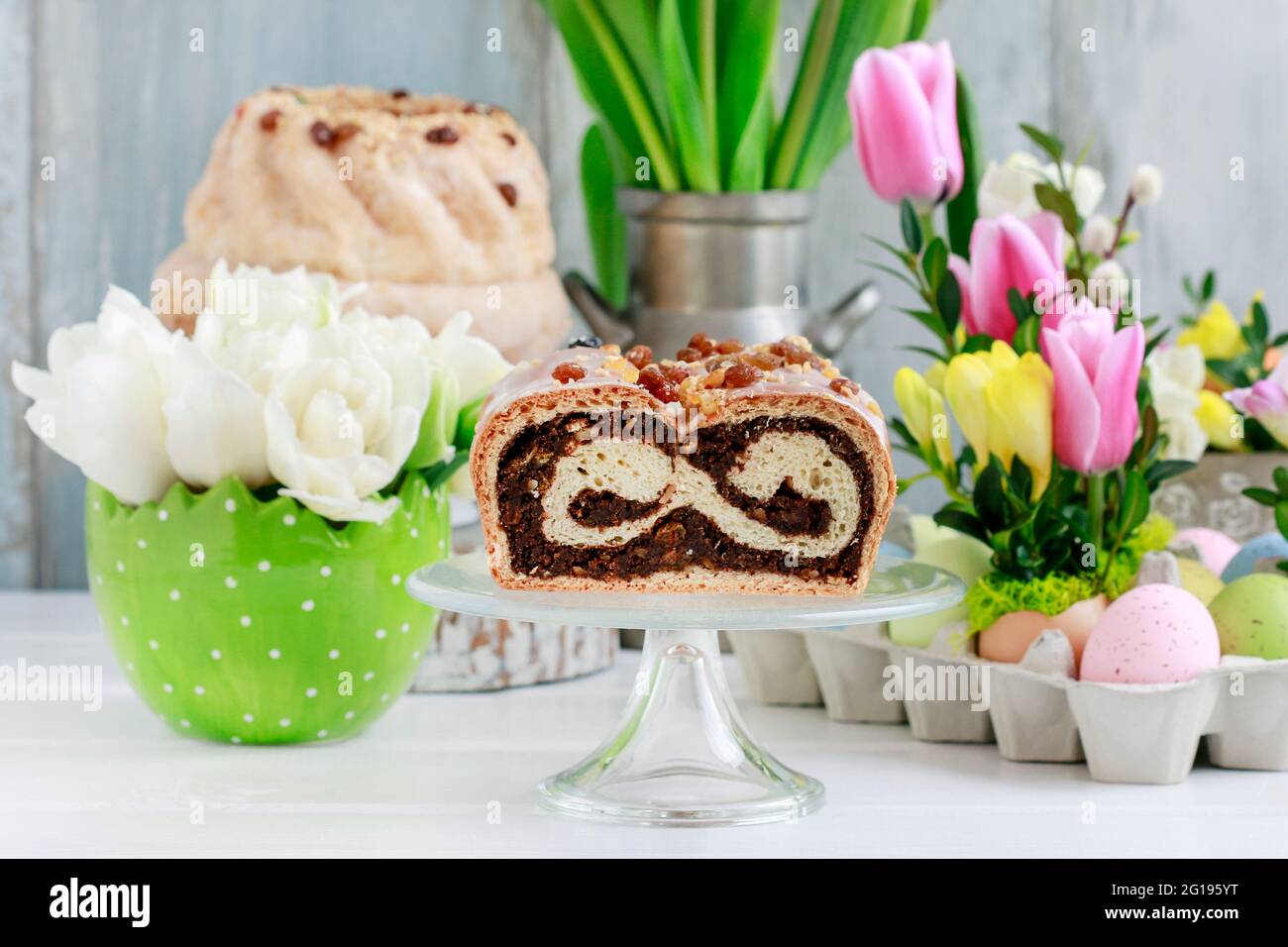 Poppy seed cake on easter table. Festive dessert Stock Photo - Alamy