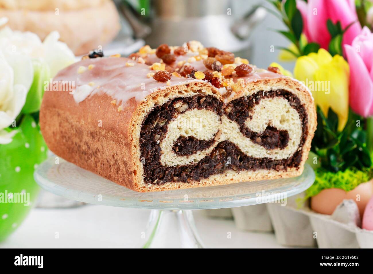 Poppy seed cake on easter table. Festive dessert Stock Photo - Alamy