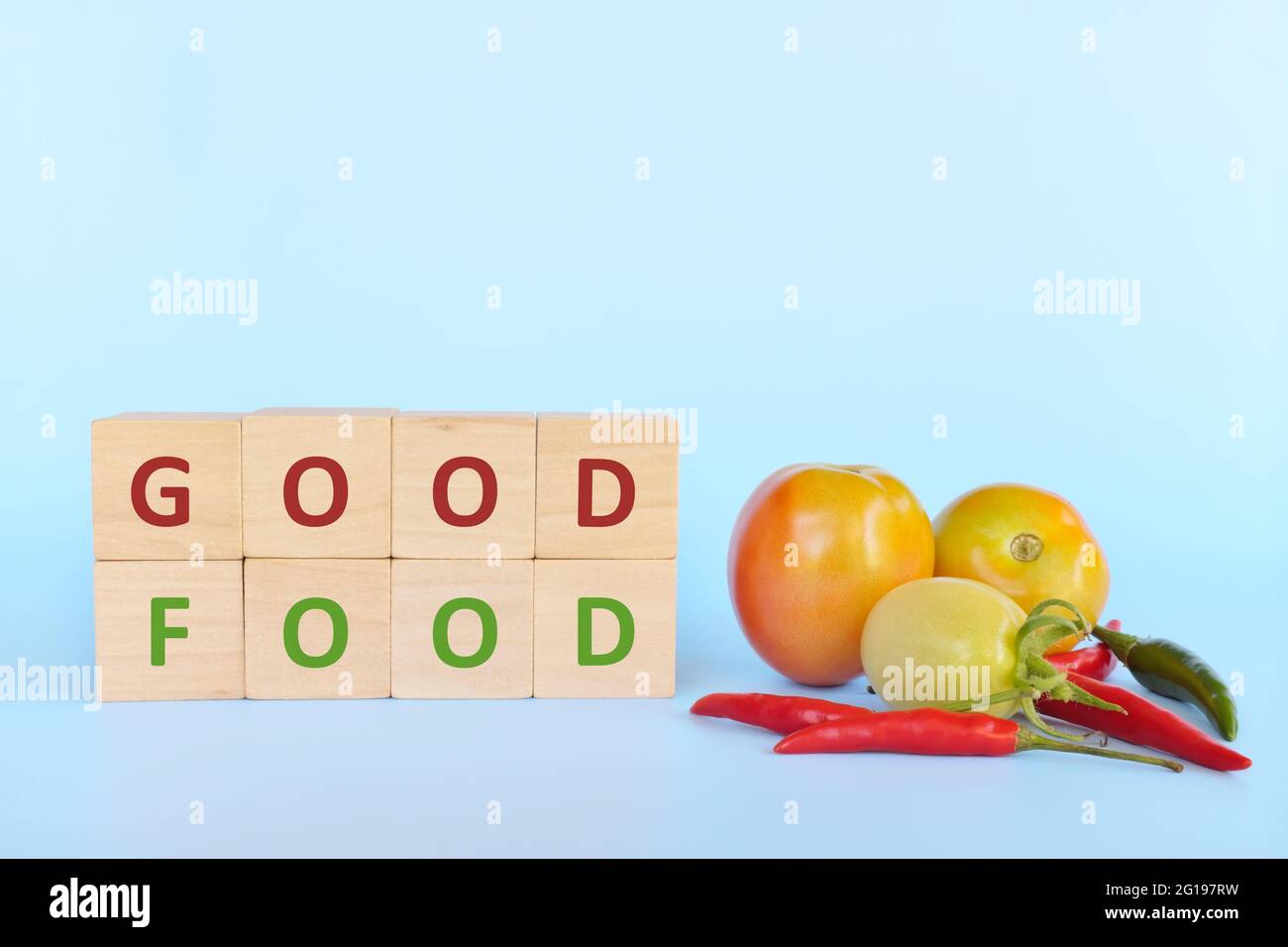 Good food and healthy eating concept. Wooden blocks typography beside ...