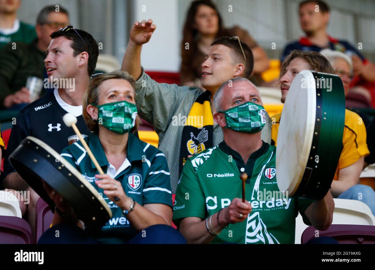 BRENTFORD, ENGLAND - JUNE 05: London Irish fans playing the drum ahead ...