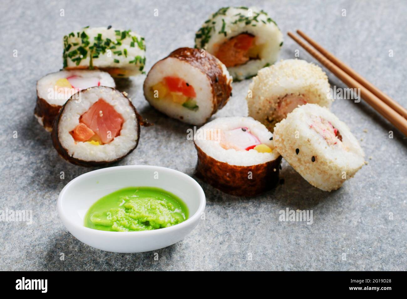 Sushi set on grey stone background. Japanese traditional dish Stock ...