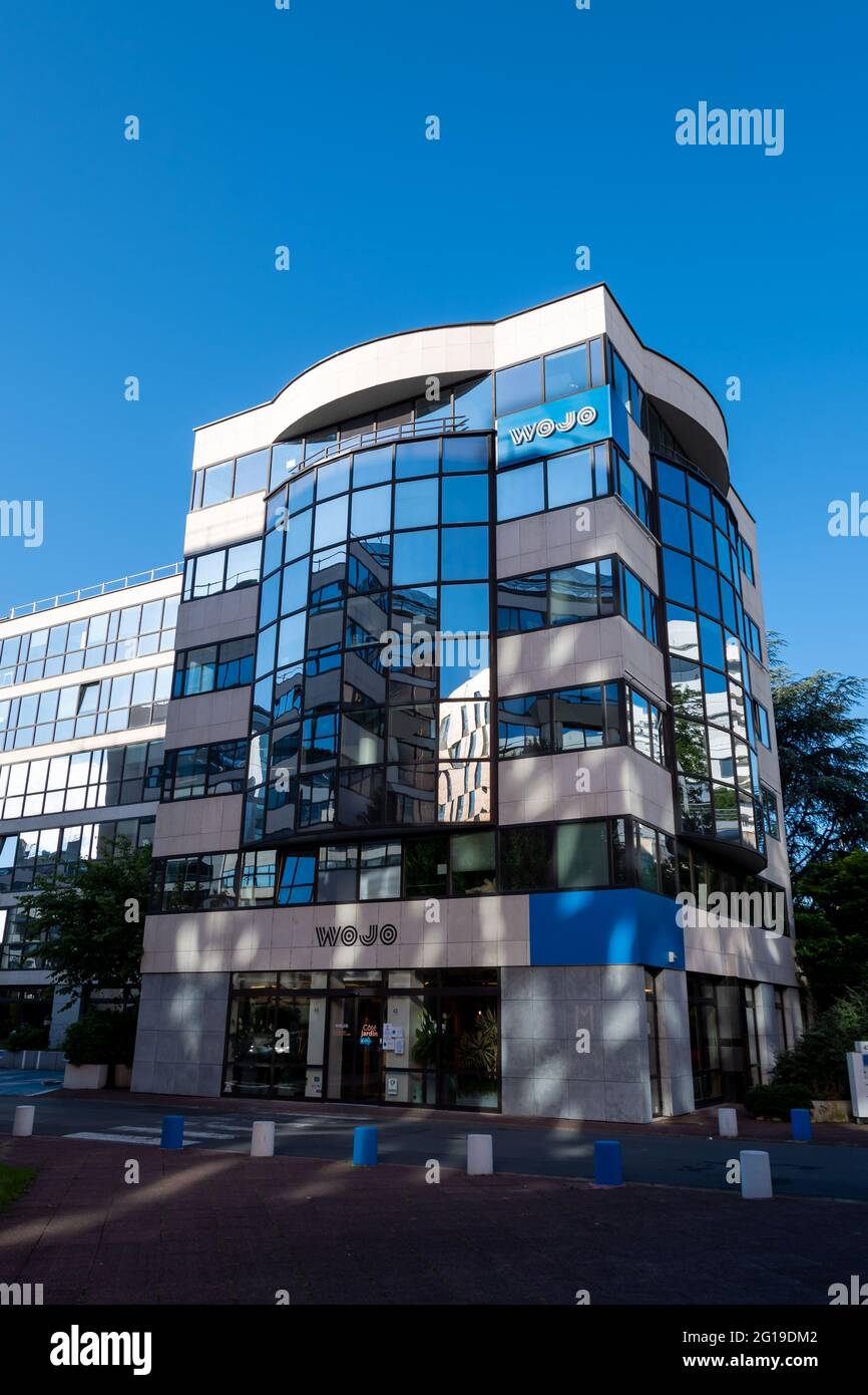 Exterior view of a Wojo building (formerly Nextdoor), a network of ...