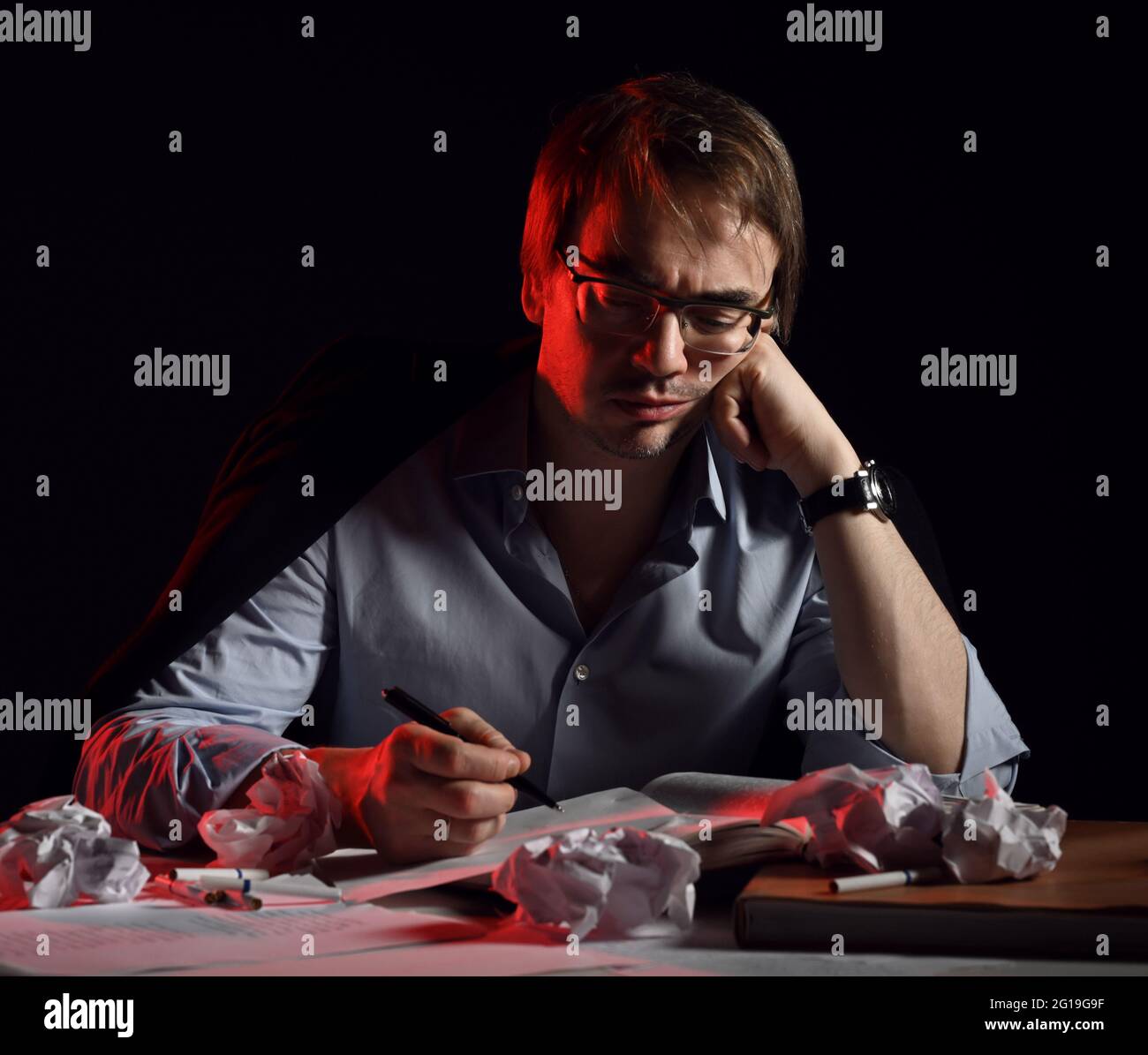 Handsome focused man sits hi-res stock photography and images - Alamy