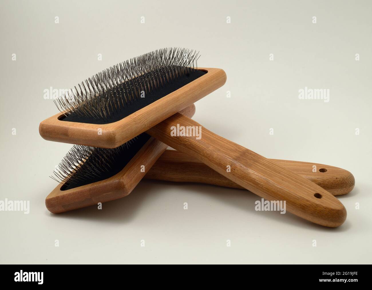 two carding brushes for combing wool on white background Stock Photo ...