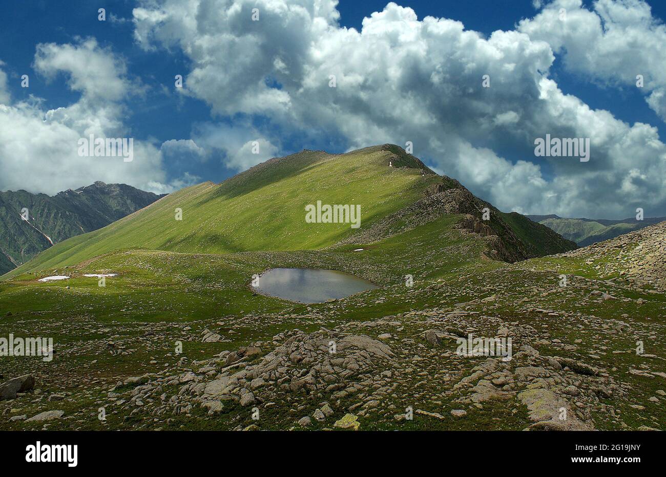Spectacular view of mountains standing side by side Stock Photo - Alamy