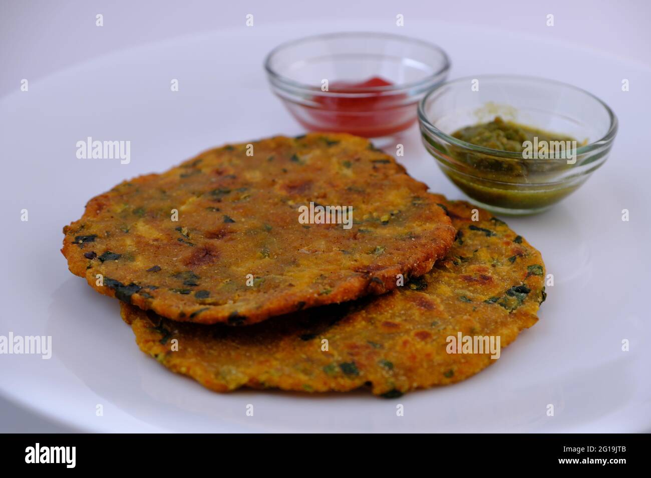 Variety of Indian flat bread thepla or paratha Stock Photo - Alamy