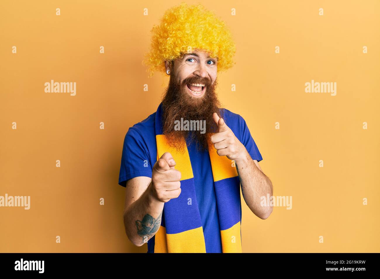 Redhead man with long beard football hooligan cheering game wearing ...