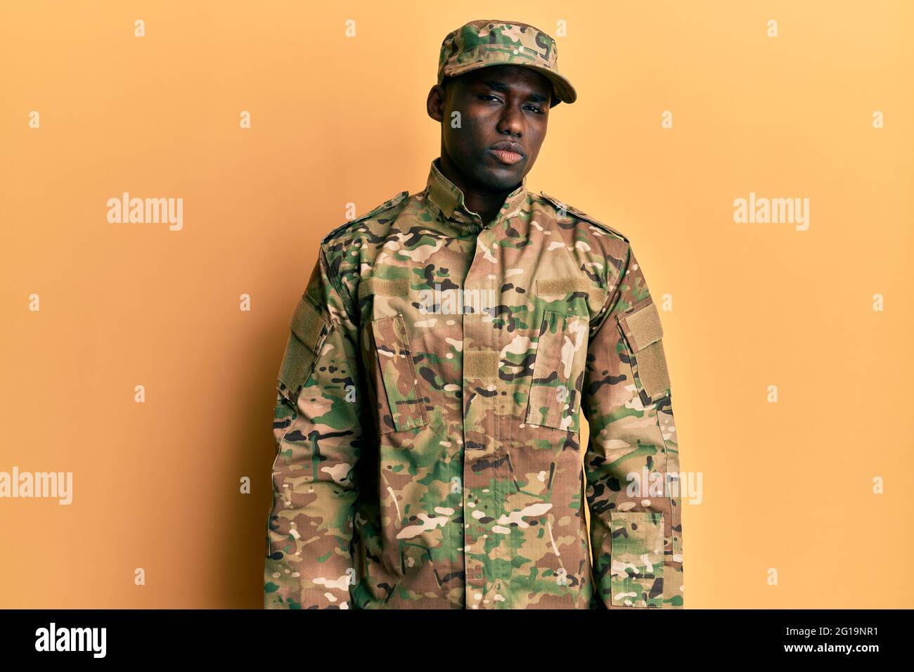 Young african american man wearing army uniform smiling looking to the ...