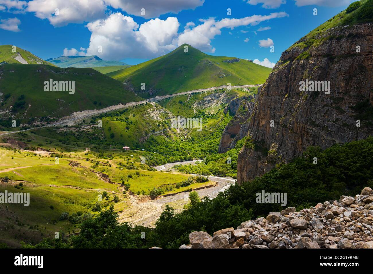 Fast mountain river in the valley Stock Photo - Alamy