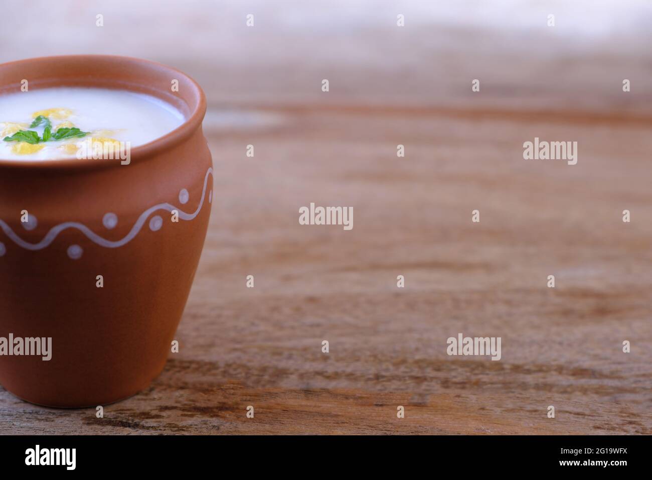 Indian style summer drink masala chach or raita made from buttermilk ...