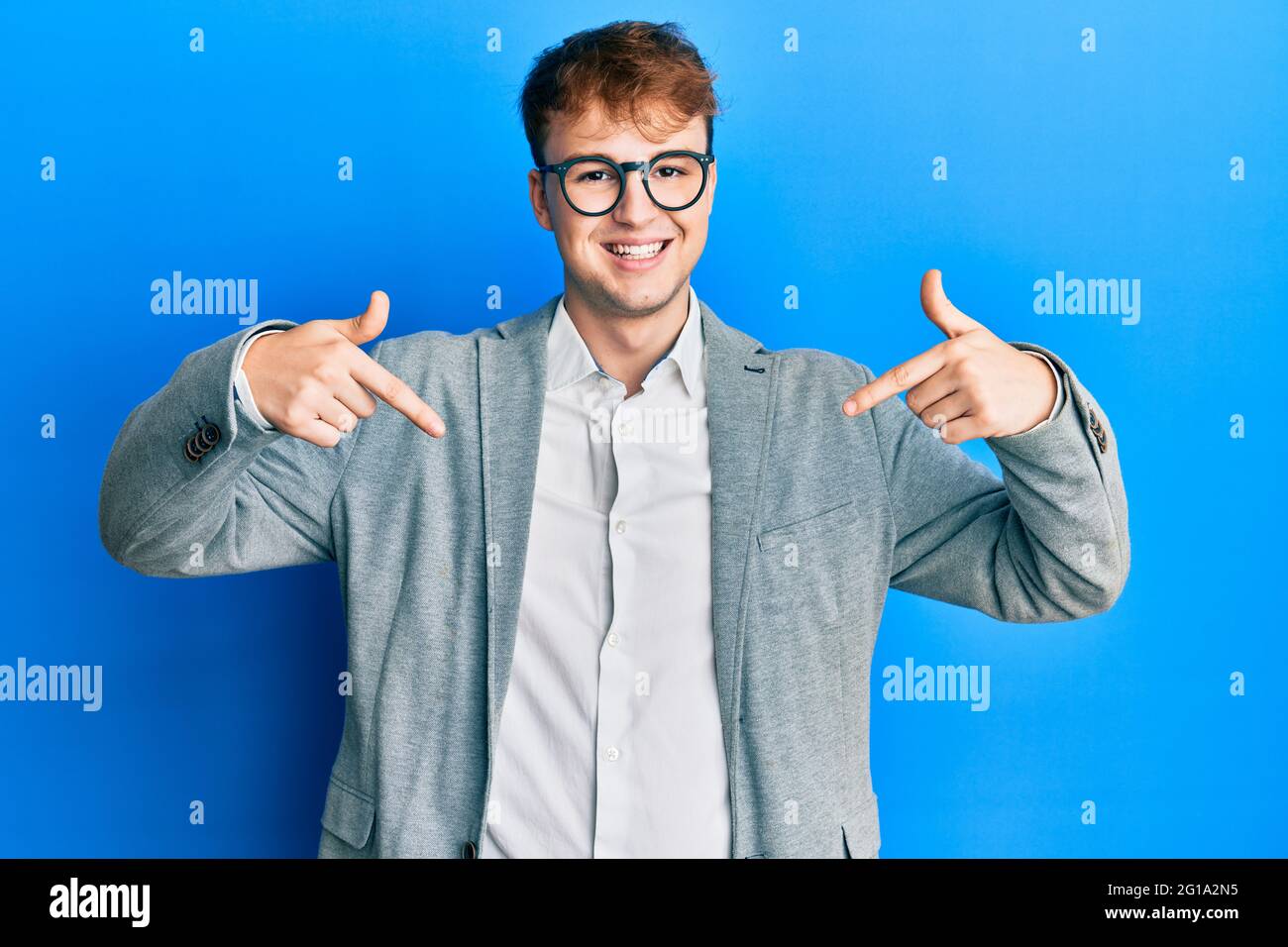 Young caucasian man wearing elegant clothes and glasses looking ...