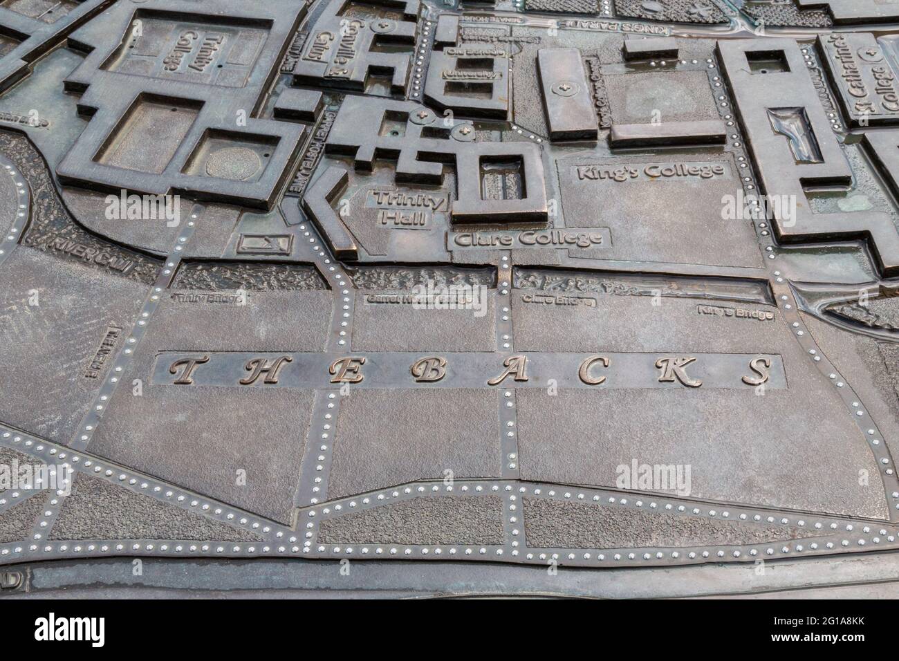 A bronze relief map shows The Backs and colleges of Cambridge ...