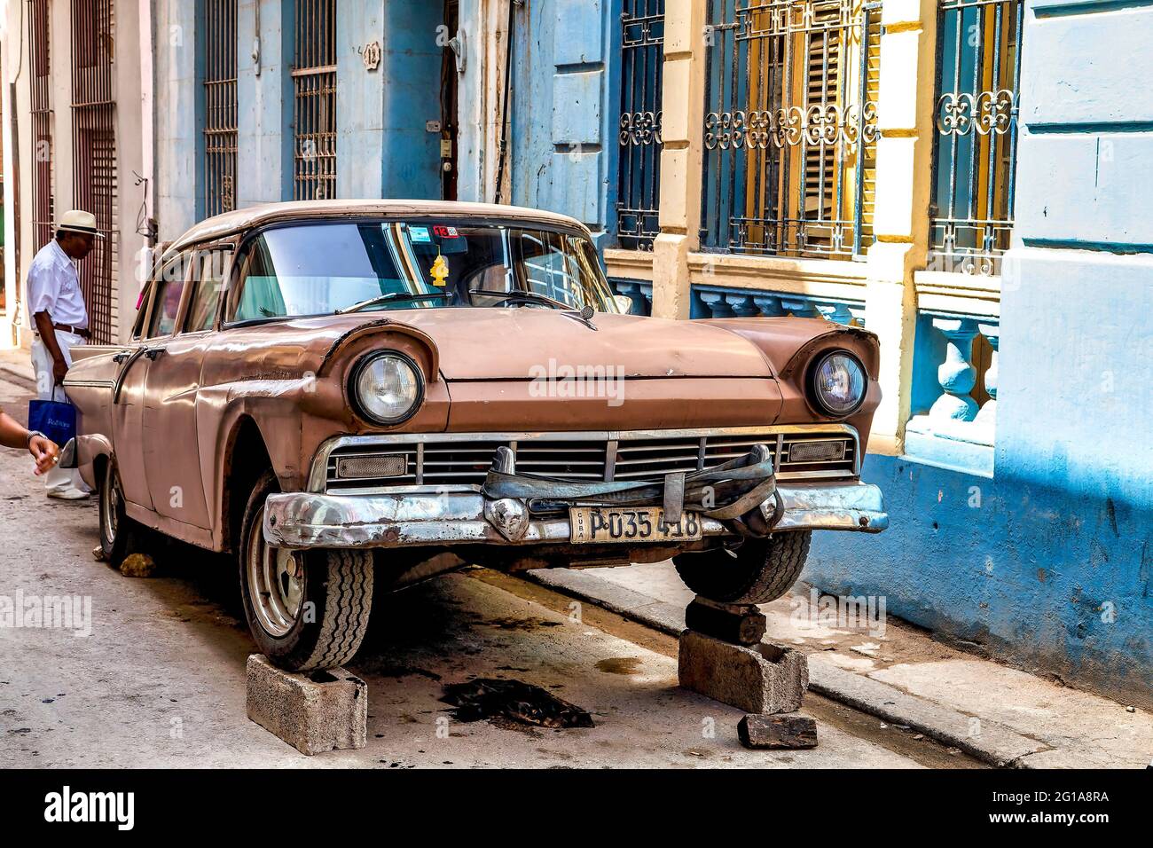 Ancient American car up on blocks in a street in old Havana, Cuba Stock ...