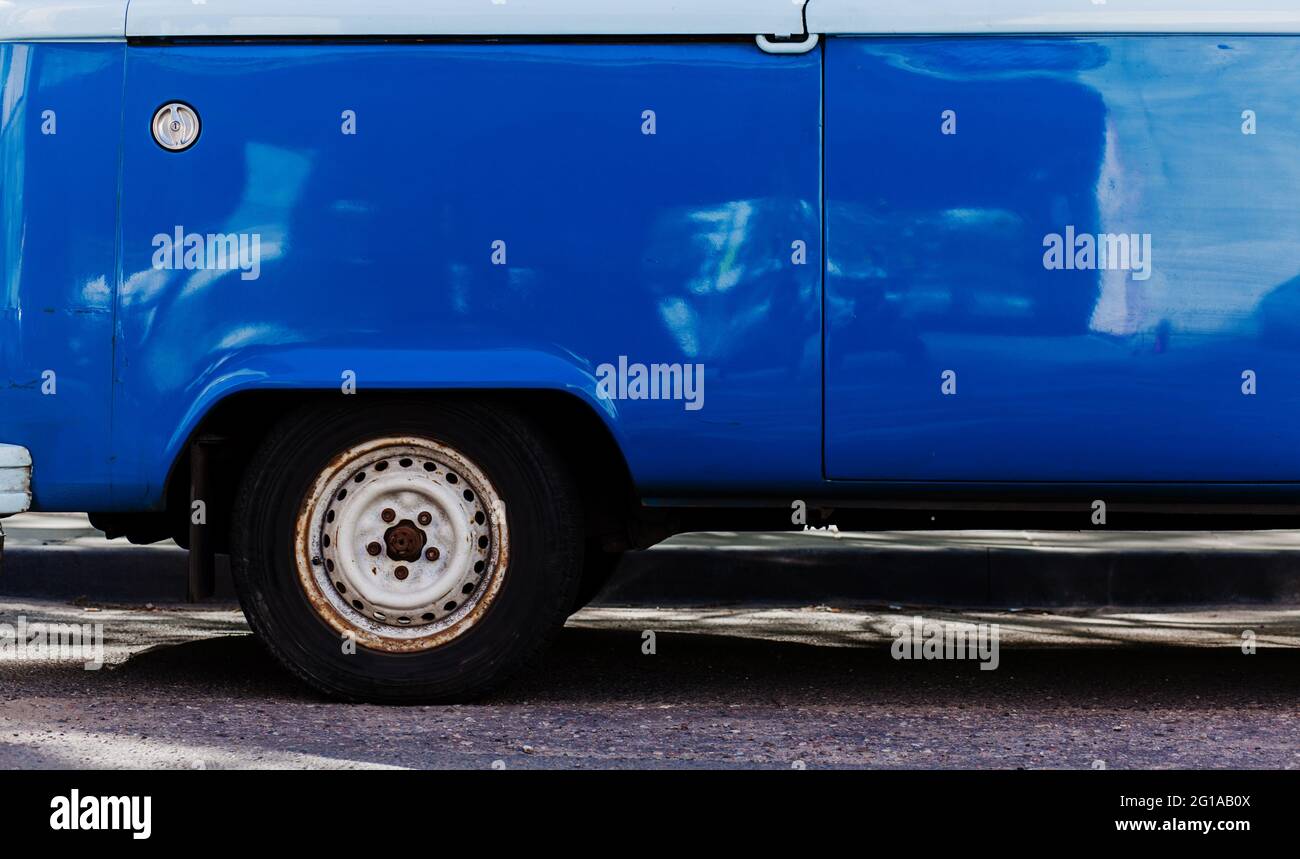 part of a vintage blue minivan. retro van Stock Photo - Alamy
