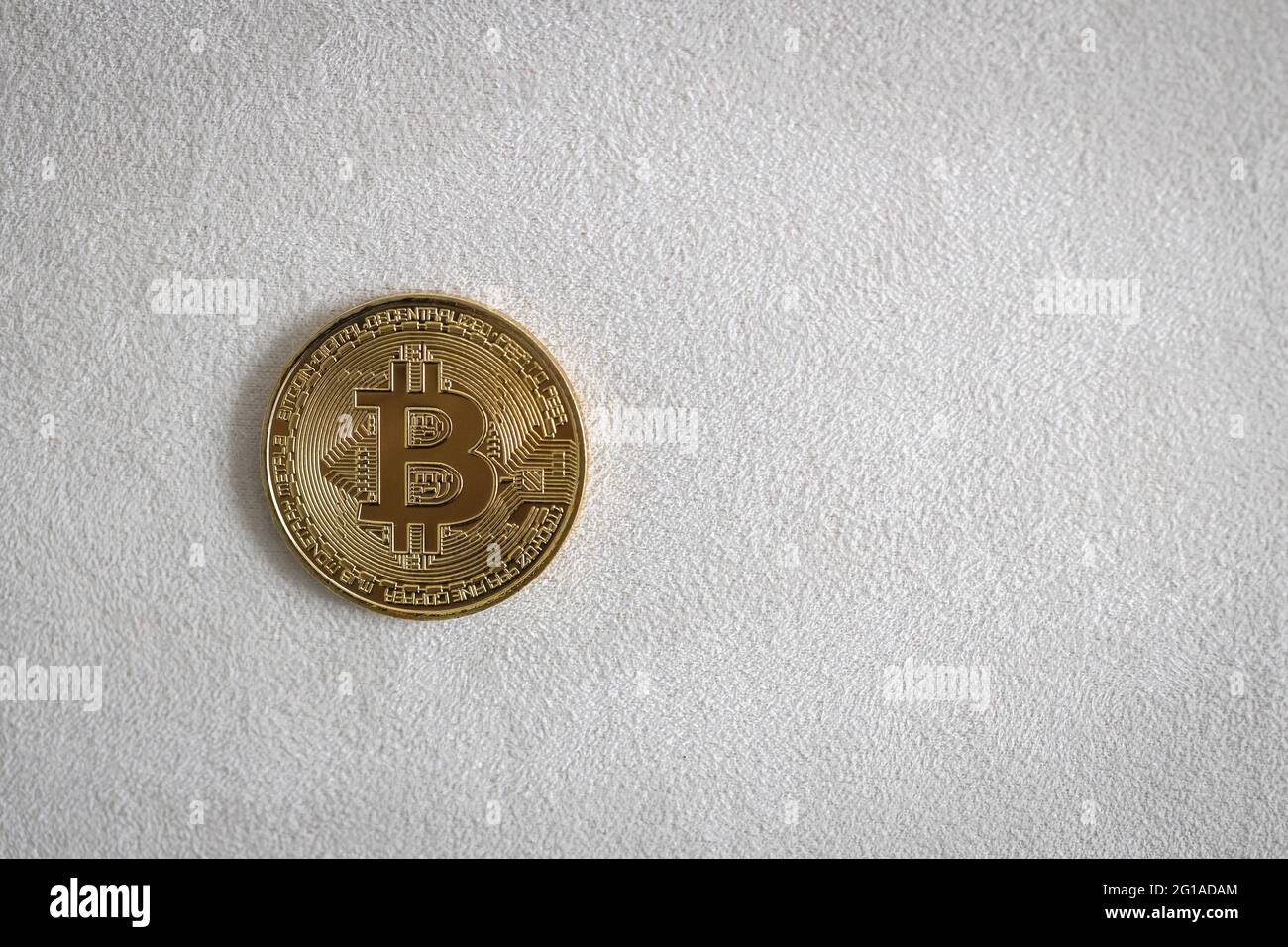 Bitcoin physical coin on white background Stock Photo - Alamy