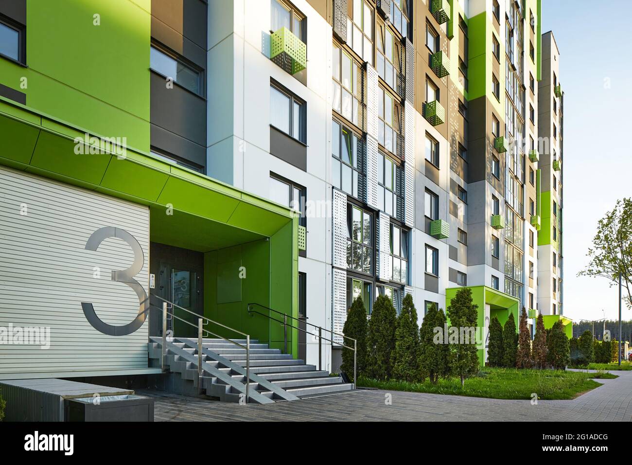 New modern block of flats in green area. residential apartment with ...