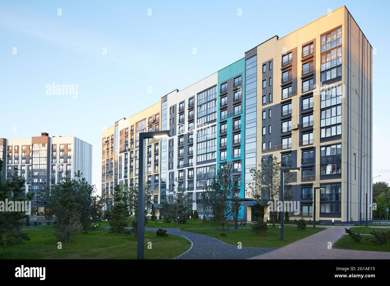 New modern block of flats in green area. residential apartment with ...