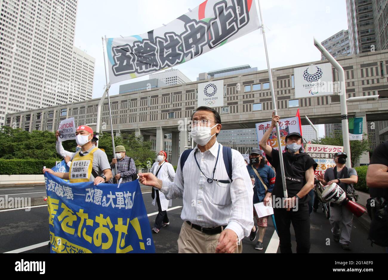 Tokyo, Japan. 6th June, 2021. Protestors stage an anti government and ...