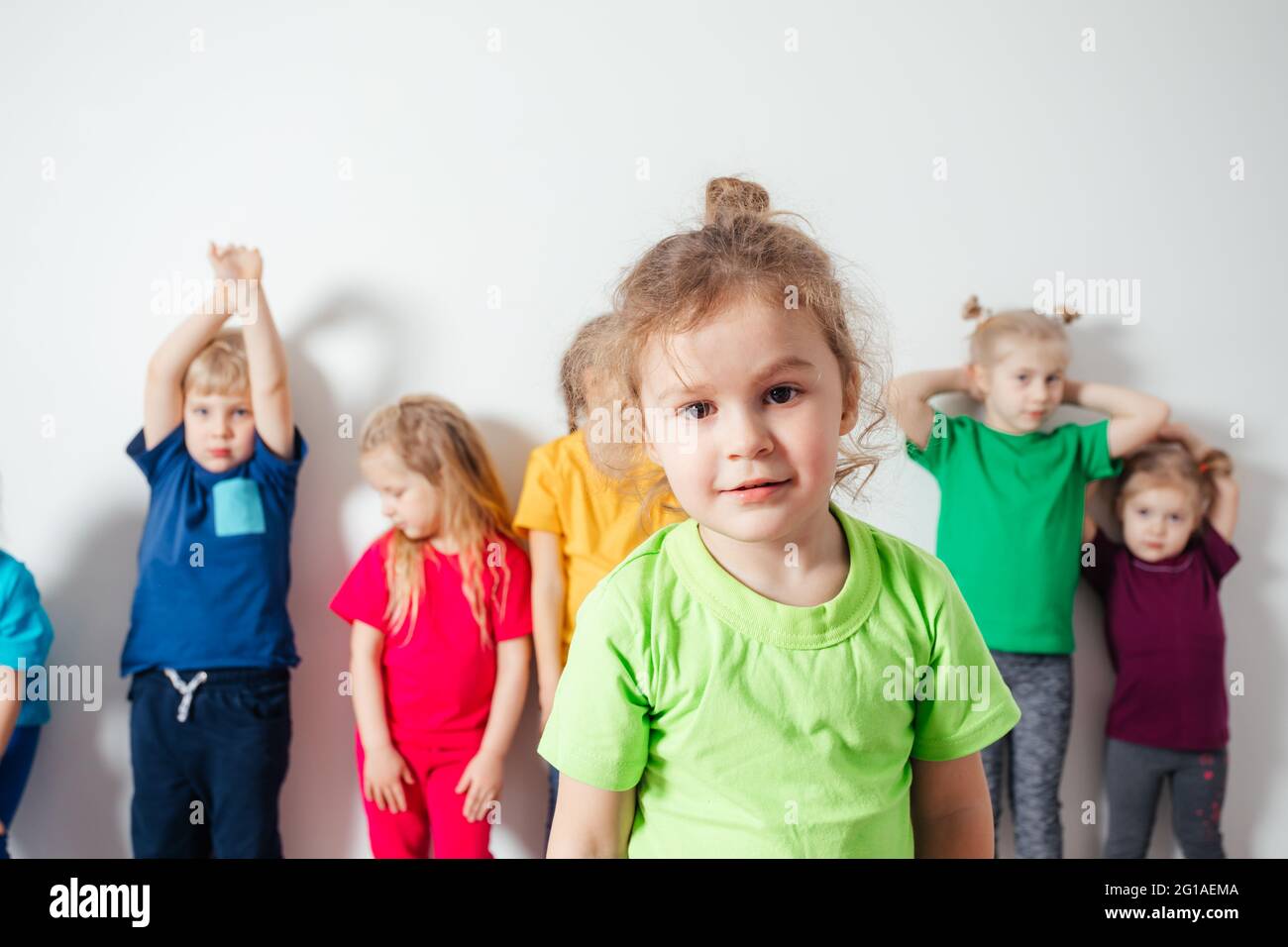 Curious boy among friends at the daycare Stock Photo - Alamy