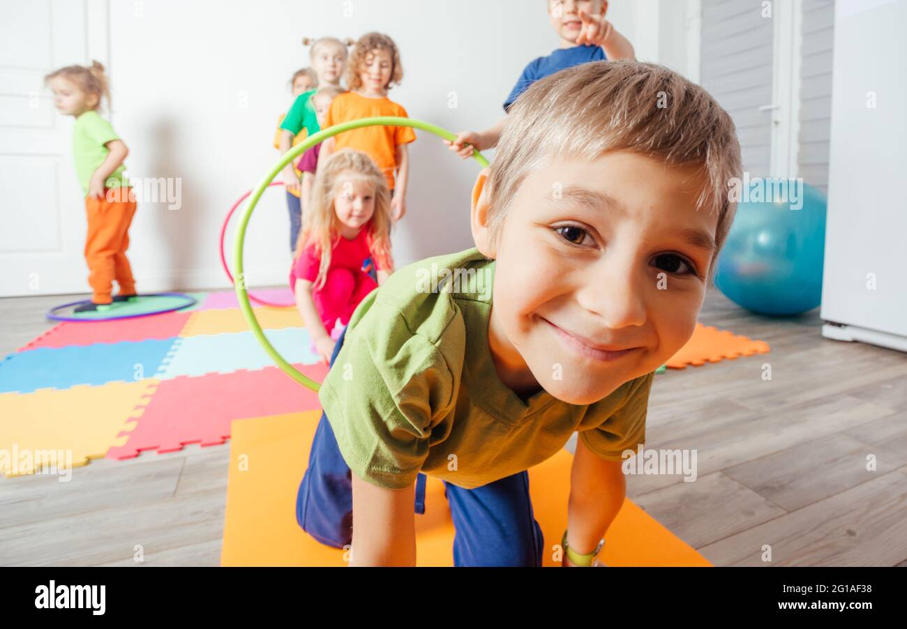 Portrait of laughing boy looking closely at the camera Stock Photo - Alamy
