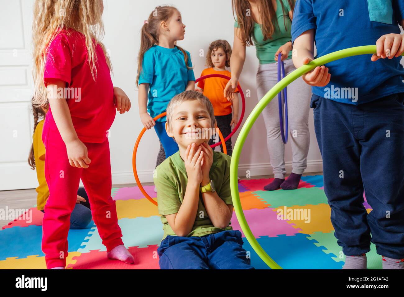 Portrait of laughing boy looking closely at the camera Stock Photo - Alamy