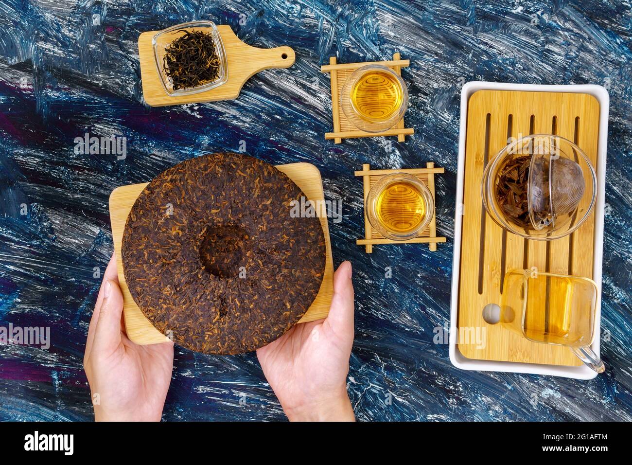 Tea ceremony with Chinese puer tea, top view. Dark background Stock ...
