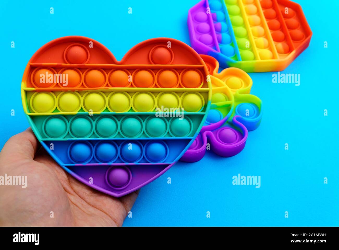 Toy pop it. Rainbow color. Antistress toy for children and adult. Top ...
