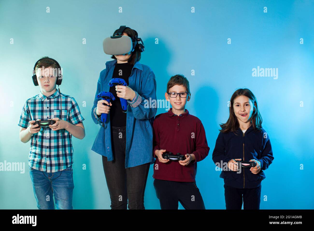 Group of kids using a gaming gadgets for virtual reality Stock Photo ...