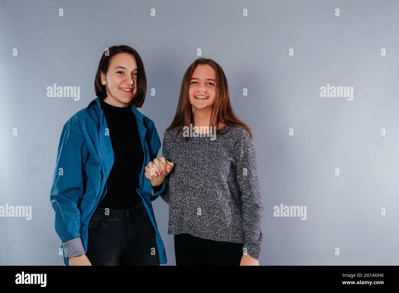Two teenage sisters are hugging each other Stock Photo - Alamy Two teenage sisters are hugging each other Stock Photo - Alamy