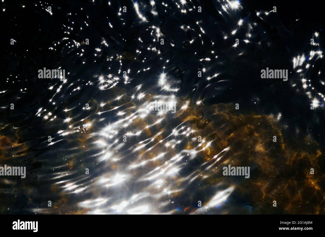 The ripples and sunlight reflection on the water surface Stock Photo ...