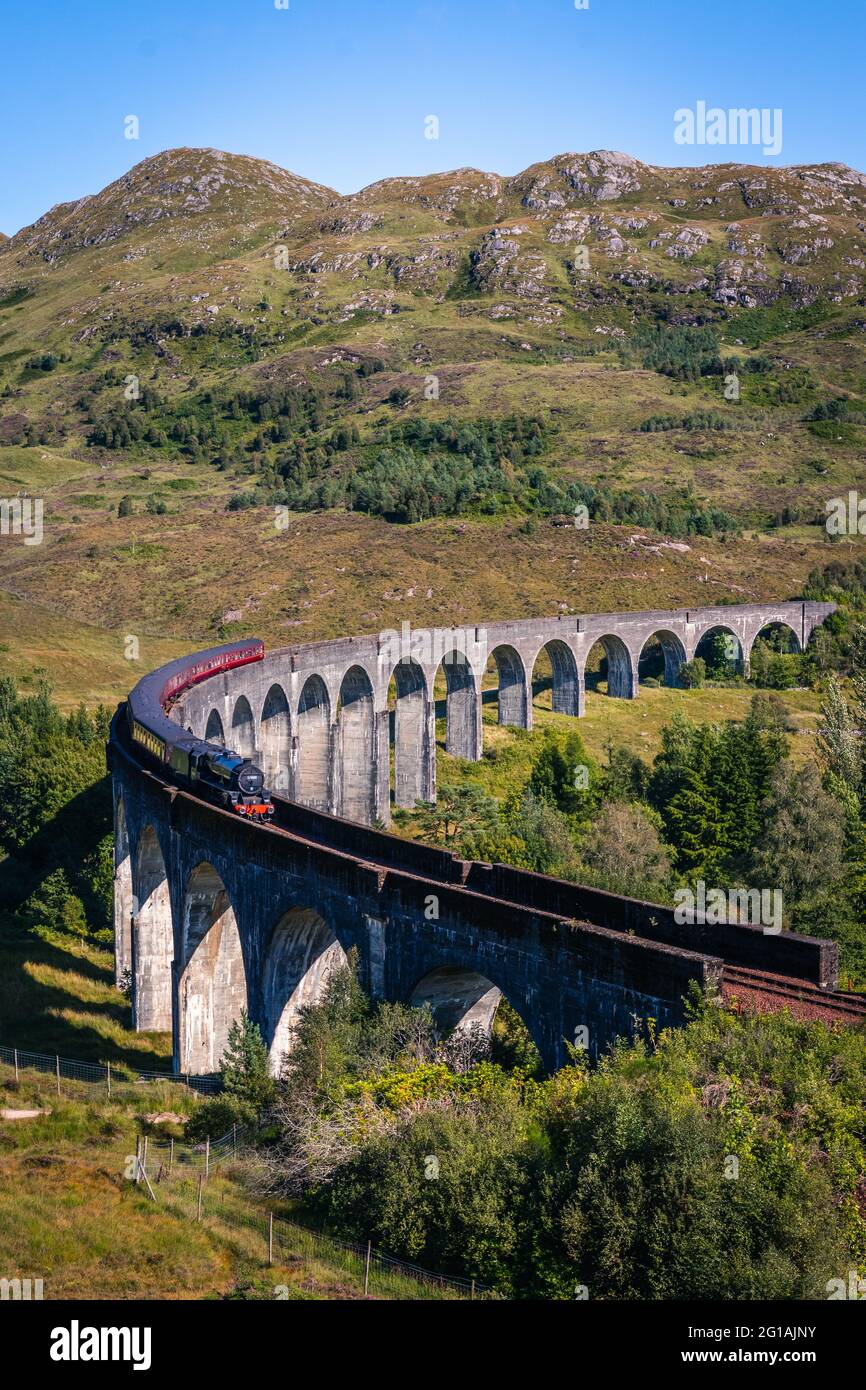 An aerial view of Glenfinnan Viaduct, a concrete archway in the ...
